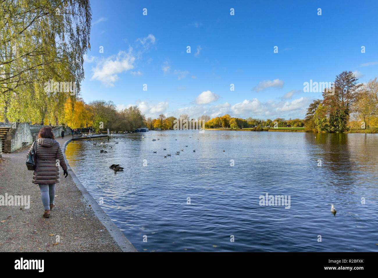 Female walking along river walk hi-res stock photography and images - Alamy