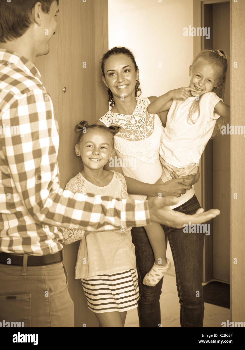 Man friendly welcoming smiling awaited guests at the doorway Stock ...