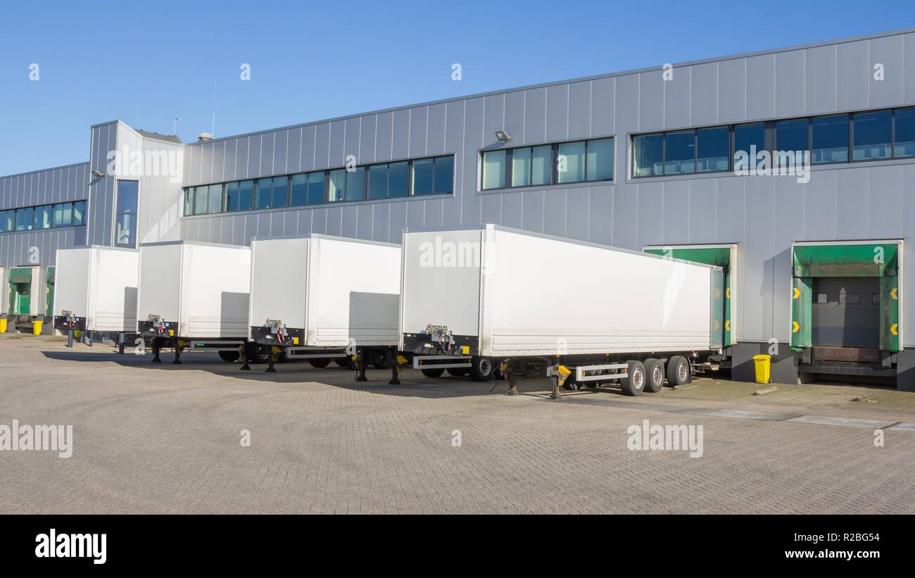Trailers at docking stations of a distribution centre waiting to be ...