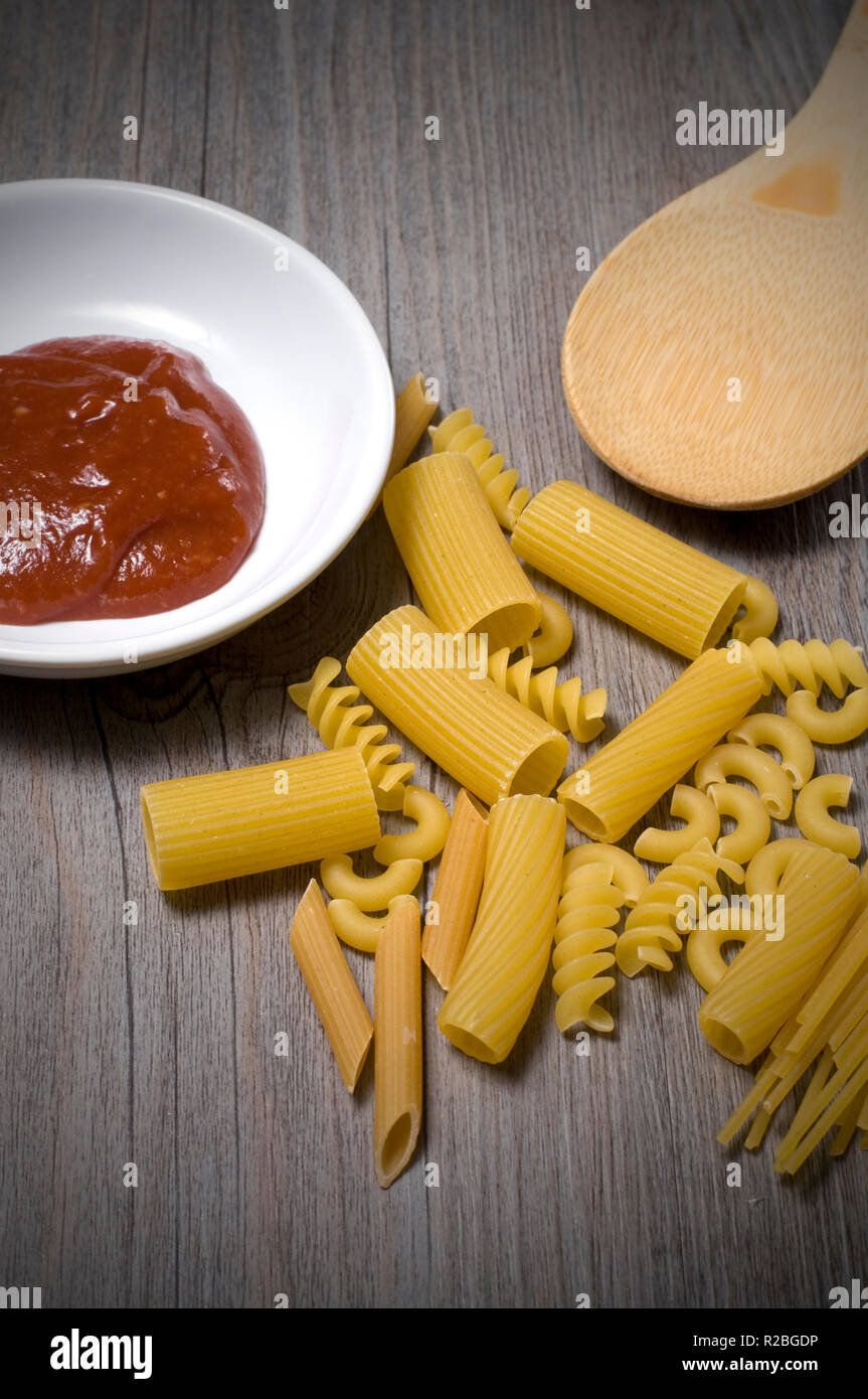 Beautiful Delicious Pastas with Wooden Spoon on Counter Stock Photo - Alamy