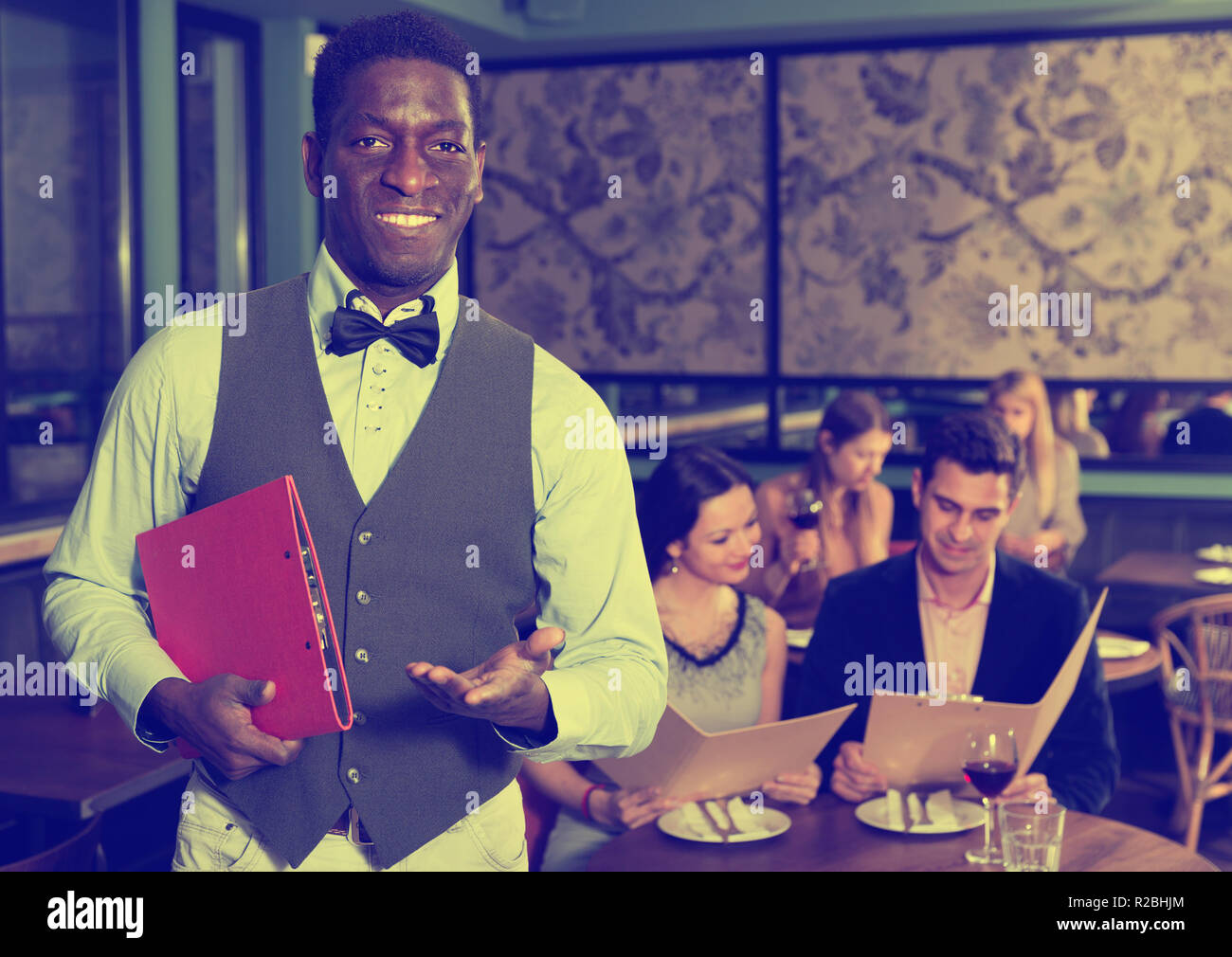 Polite African American cheerful positive smiling male administrator ...