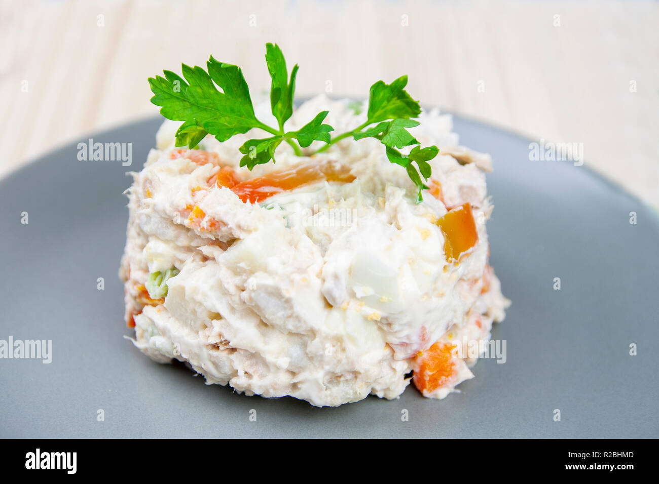 Russian salad with parsley Stock Photo - Alamy