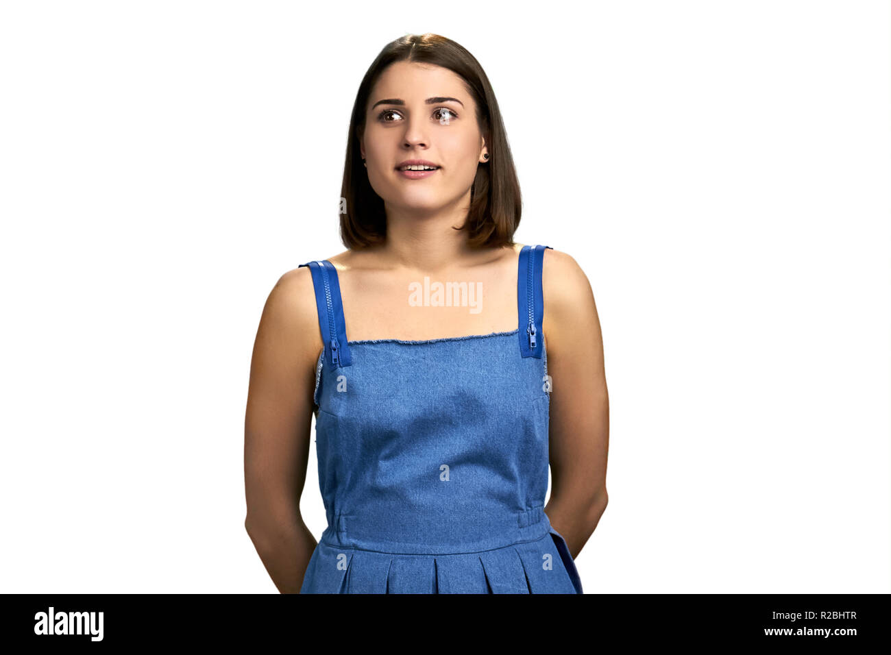 Portrait of pretty girl looking aside. Happy smiling girl looking aside ...