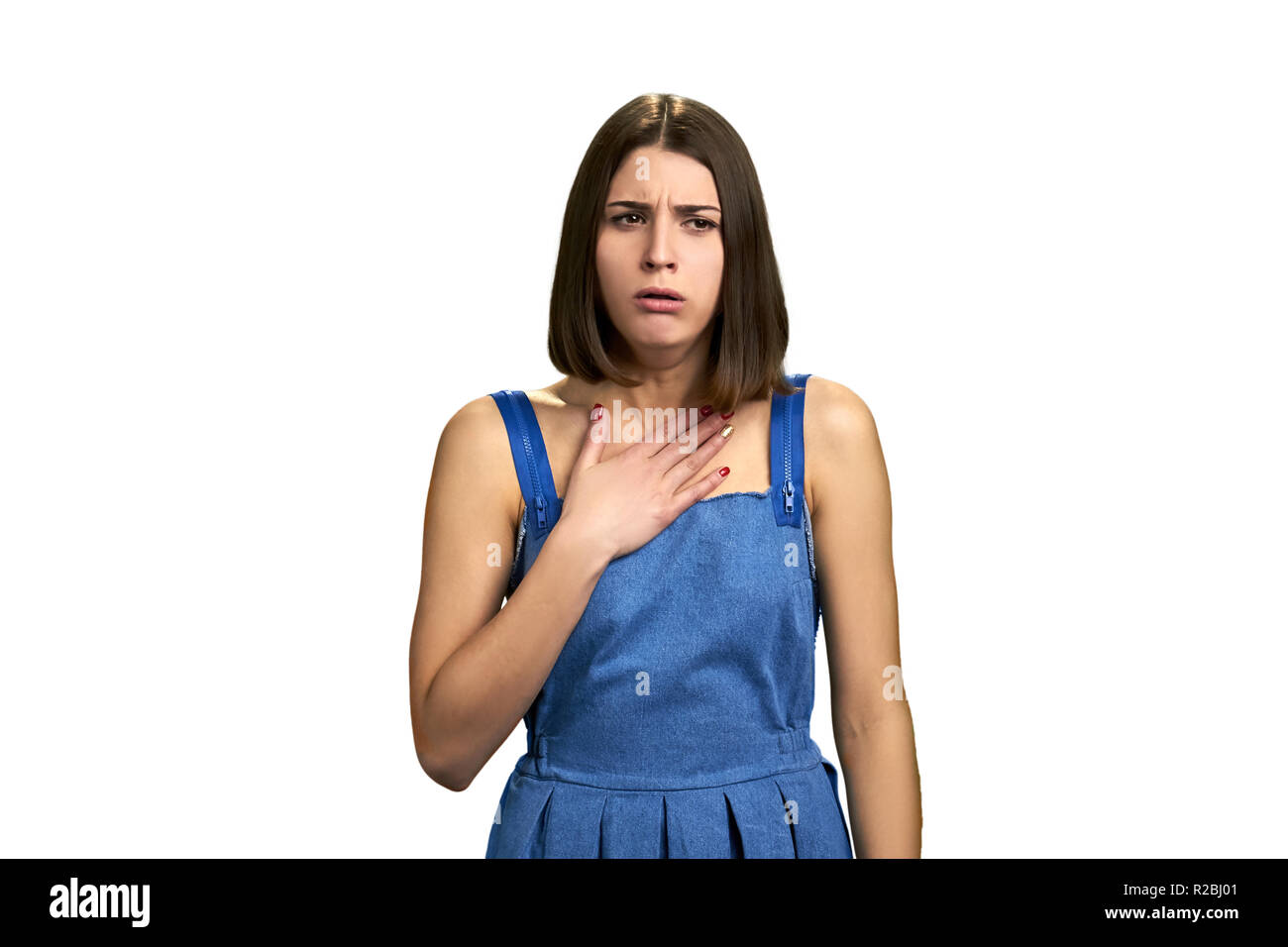 Coughing girl on white background. Portrait of young pretty woman ...