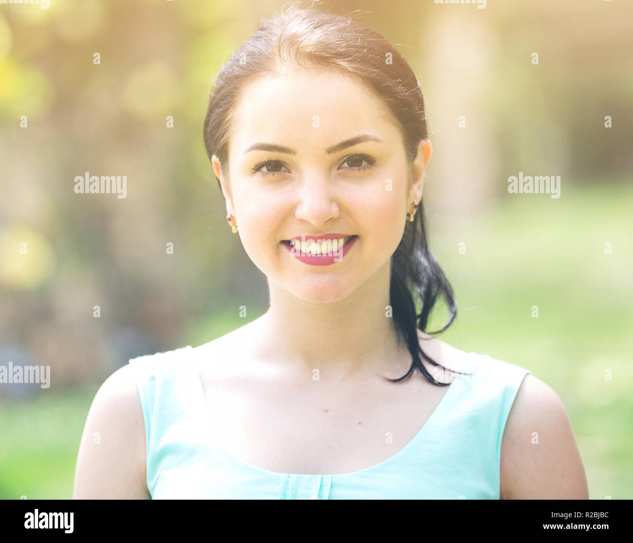 sunny cheerful smiling young russian woman portrait in outdoors Stock ...