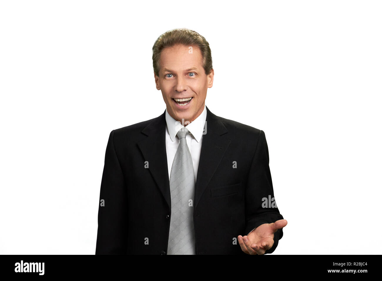 Shocked happy businessman on white background. Happy man in business ...