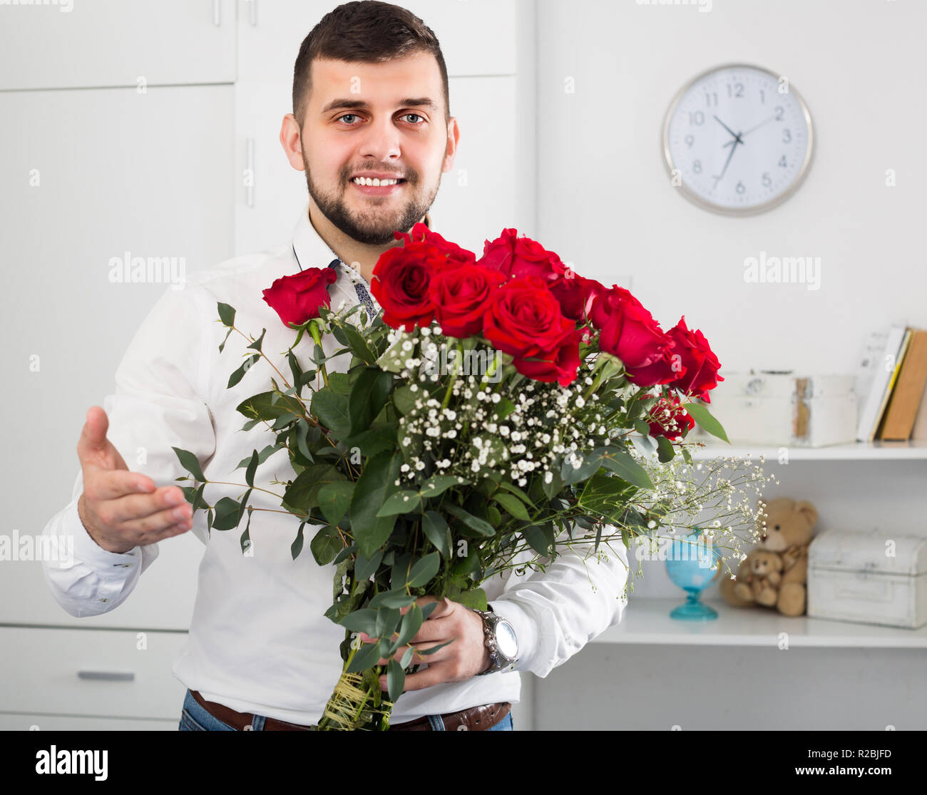 Male 29-34 years old is presenting flowers and gift during romantic ...