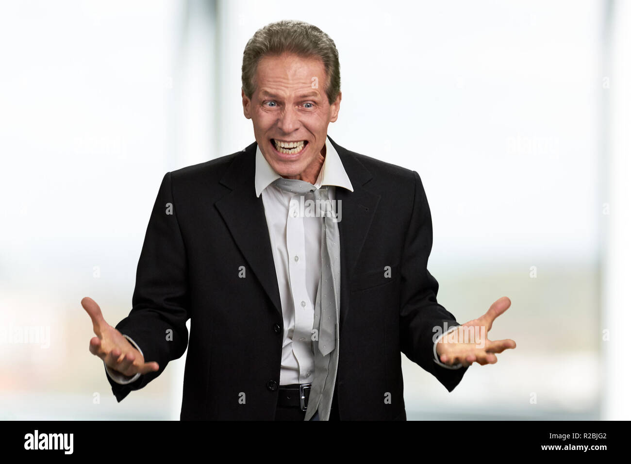Portrait of desperate angry businessman. Aggressive middle-aged man in ...