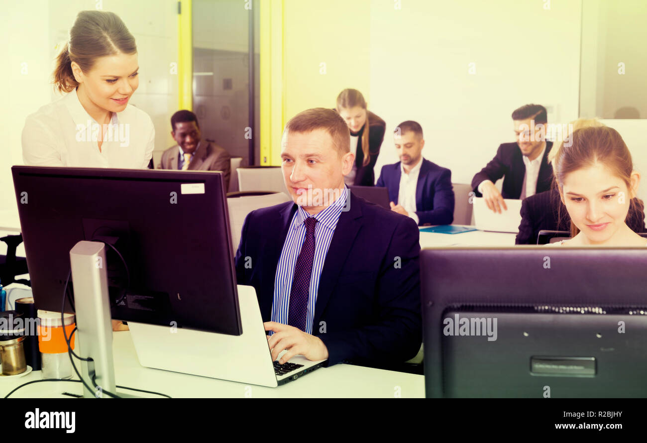 Group of successful business people during daily work in modern co ...