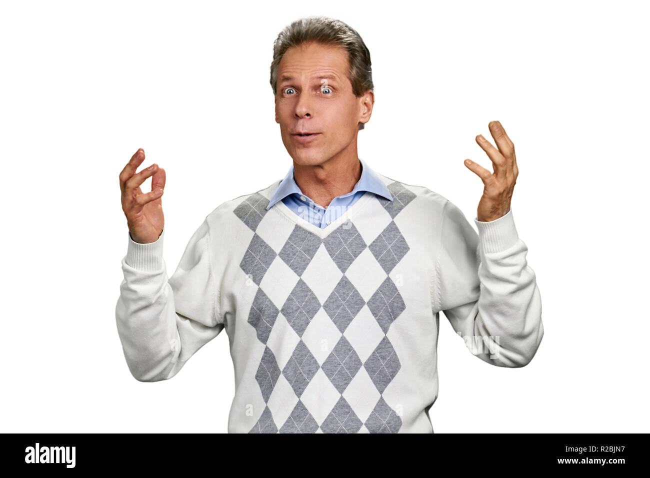 Happy surprised man on white background. Shocked cheerful man raised ...