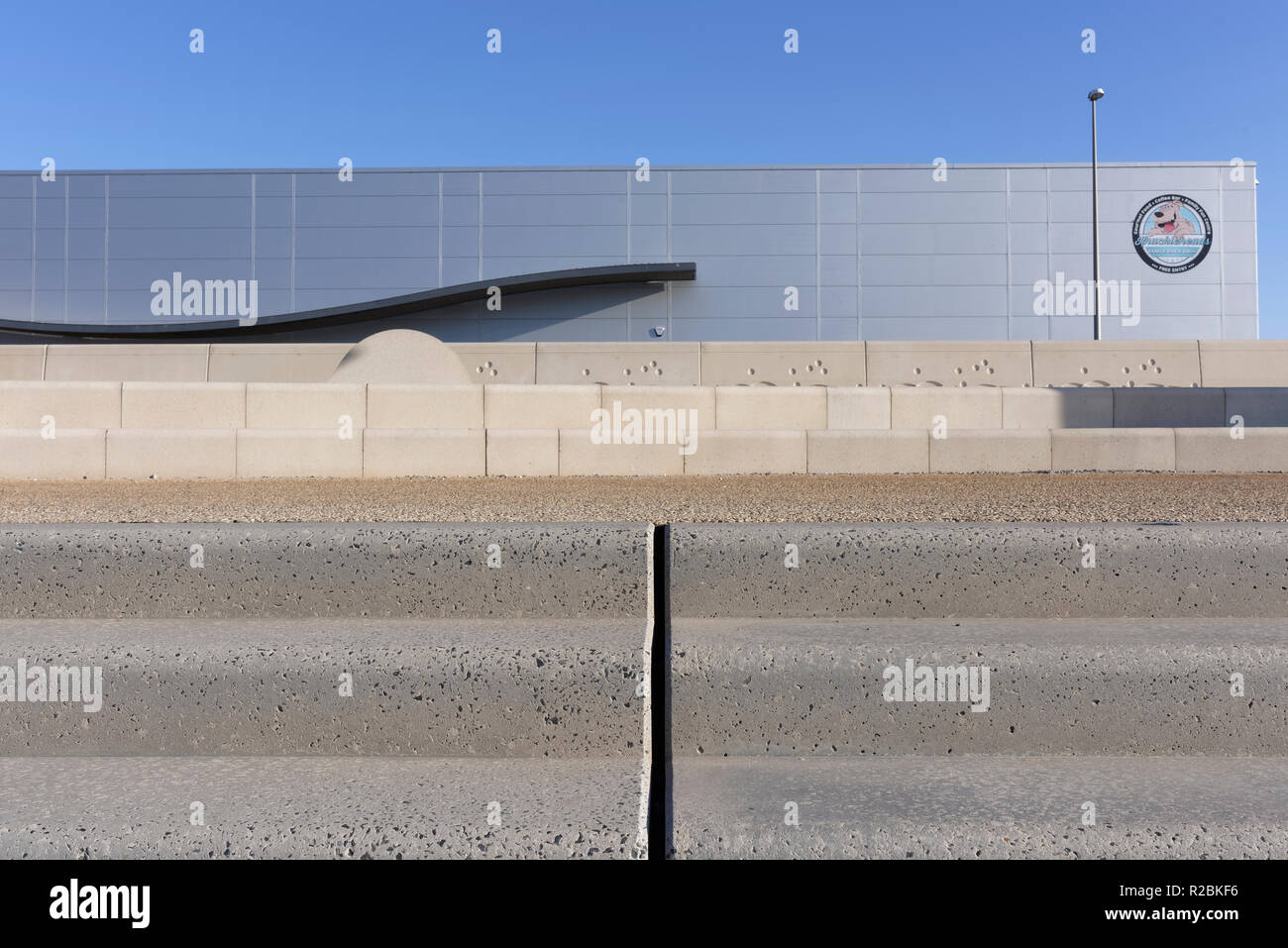 Concrete stepped revetment with drainage channel, sea wall and ...