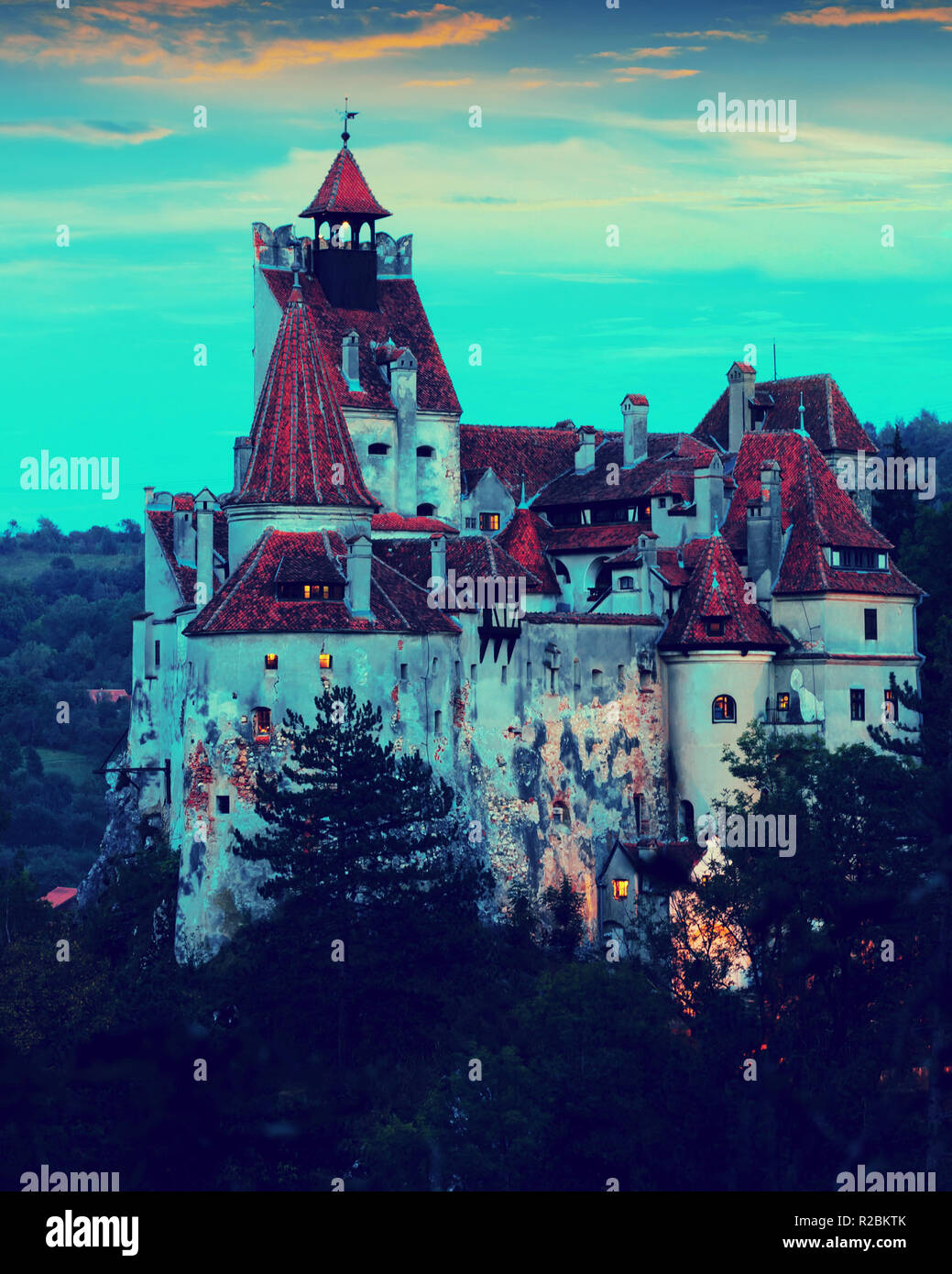 Medieval Bran Castle commonly known as Dracula Castle at sunset ...