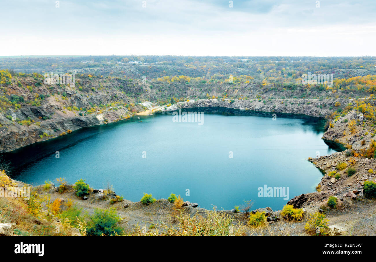 great radon blue lake, granite quarry in autumn, picturesque landscape ...