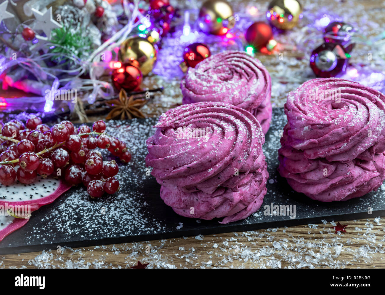 Red currant marshmallow, handmade. A cup of coffee with dessert on the ...