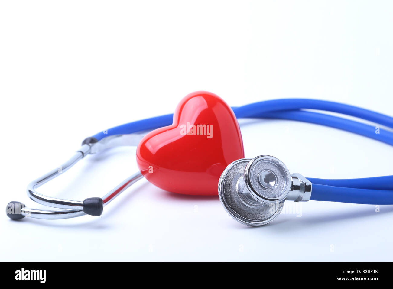Medical stethoscope and red heart isolated on white Stock Photo - Alamy