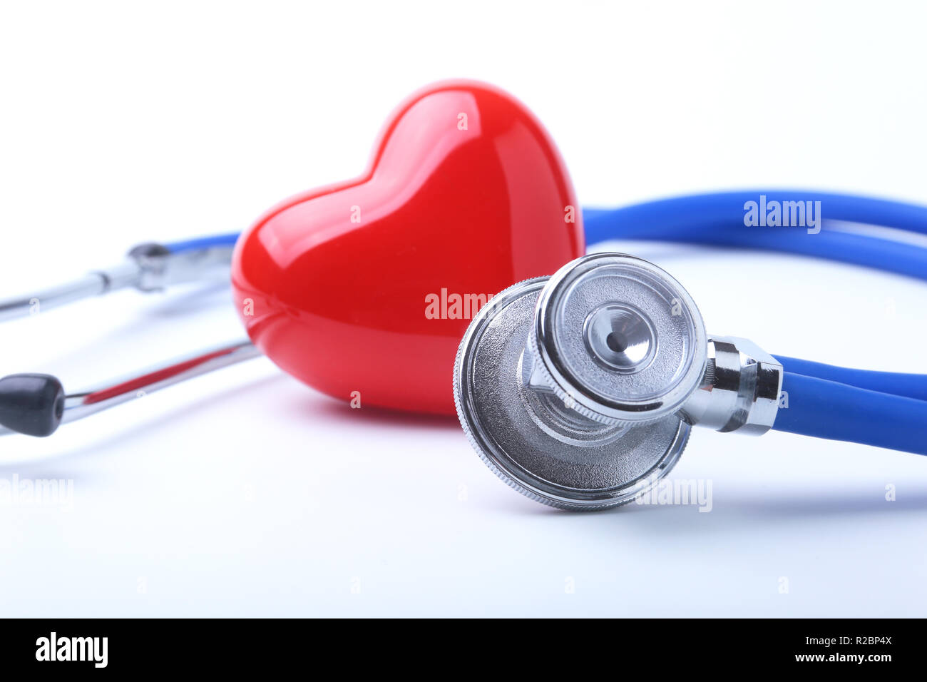 Medical stethoscope and red heart isolated on white Stock Photo - Alamy