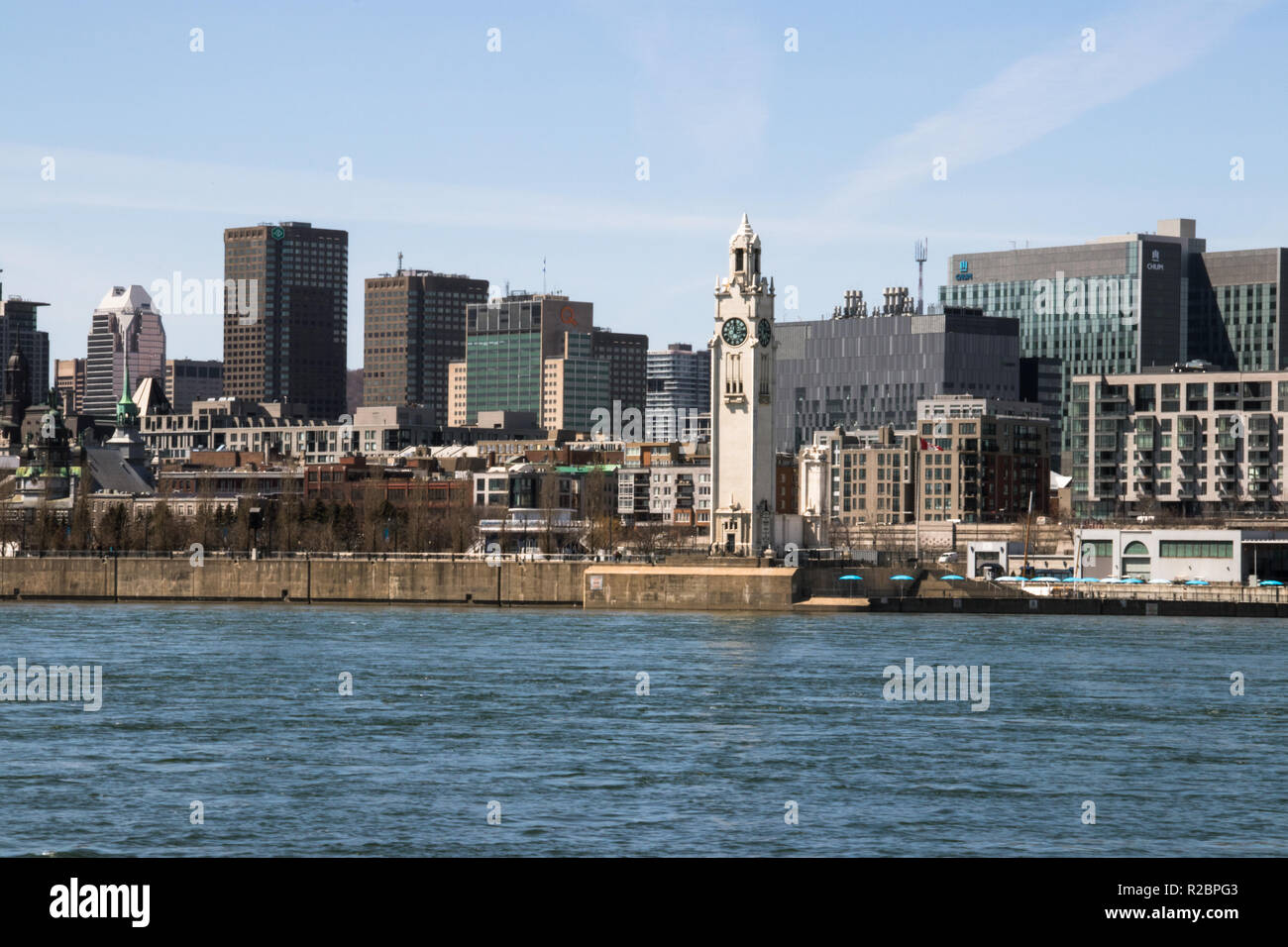View of Old Montreal and Clock Tower in early spring - cityscape with ...