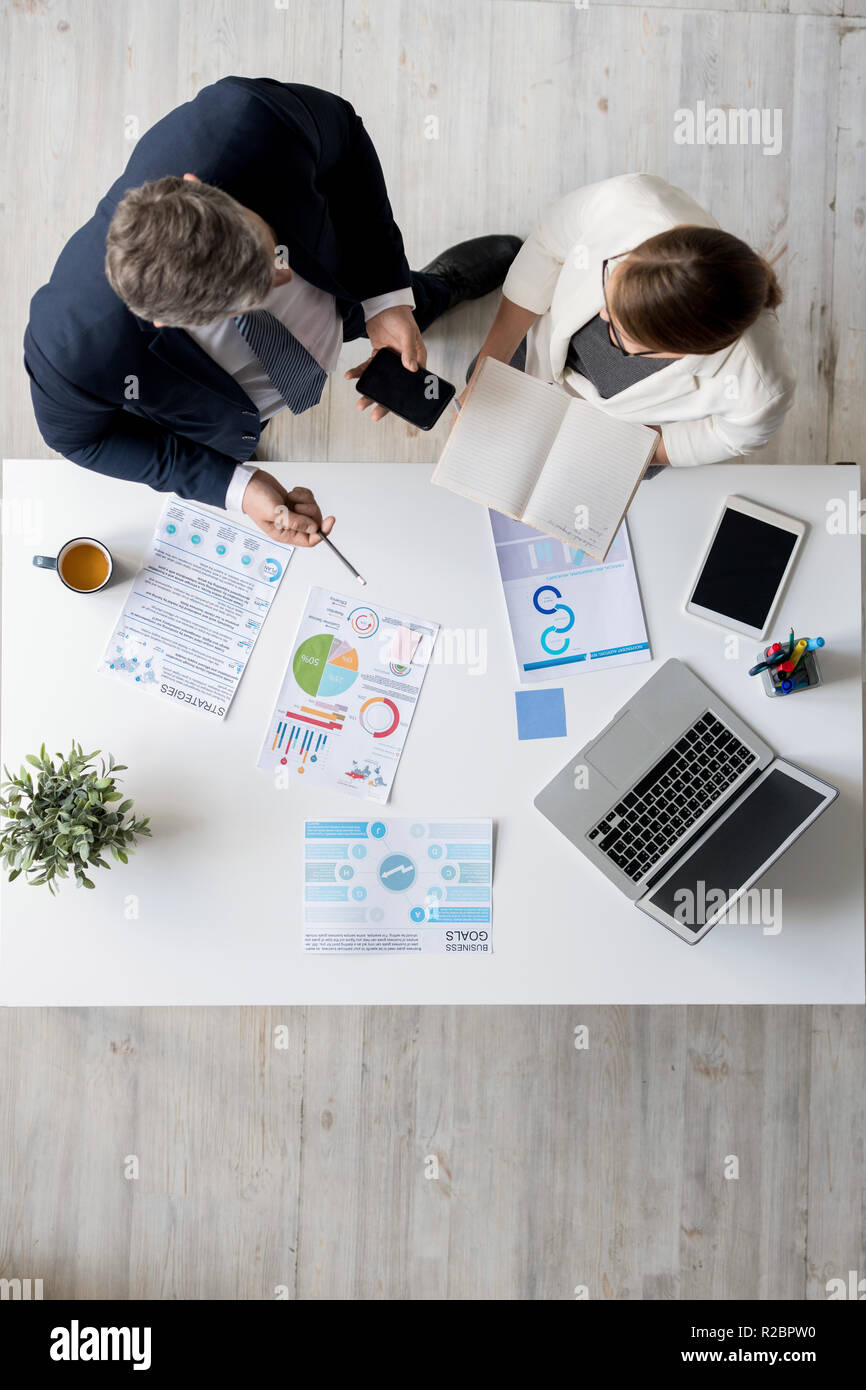 Allocating tasks among each other Stock Photo - Alamy