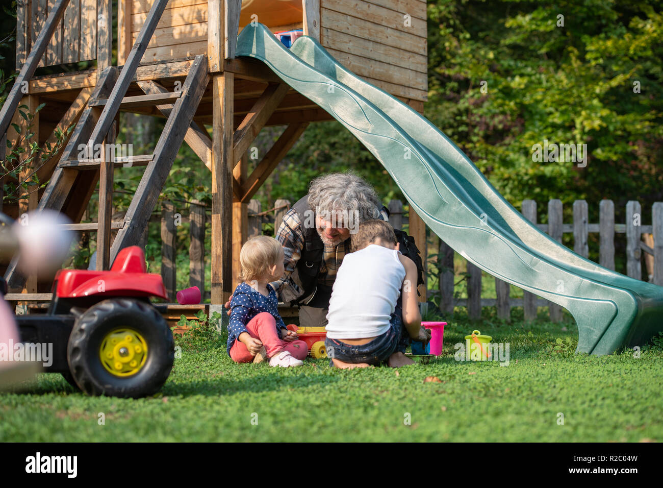 Grandchildren playing outside hi-res stock photography and images - Alamy
