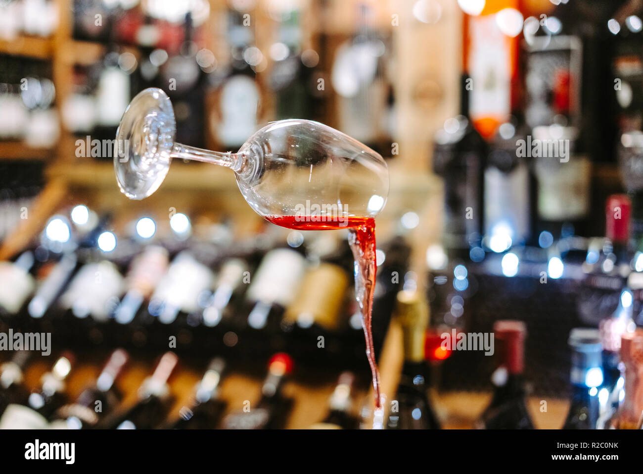 Glass of Wine Falling Mid Air with Spill Stock Photo - Alamy