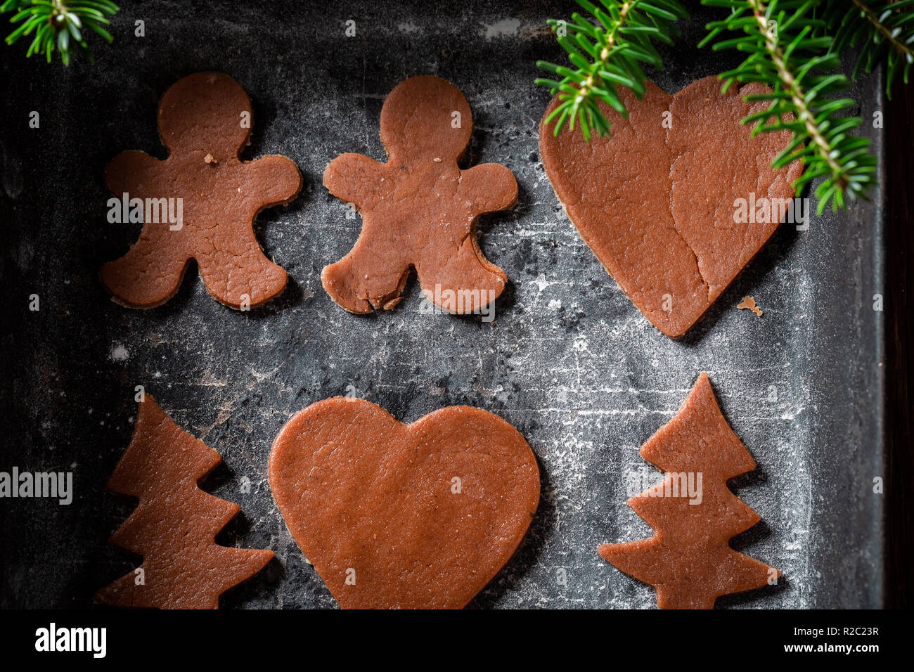 Top view of gingerbread cookies before baking on baking tray Stock ...
