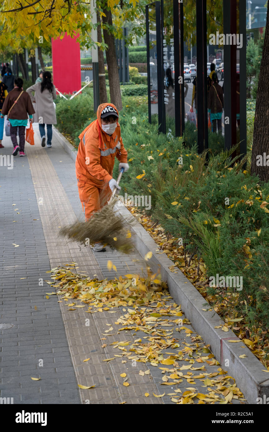 Street cleaner in City Business District in Beijing Stock Photo - Alamy