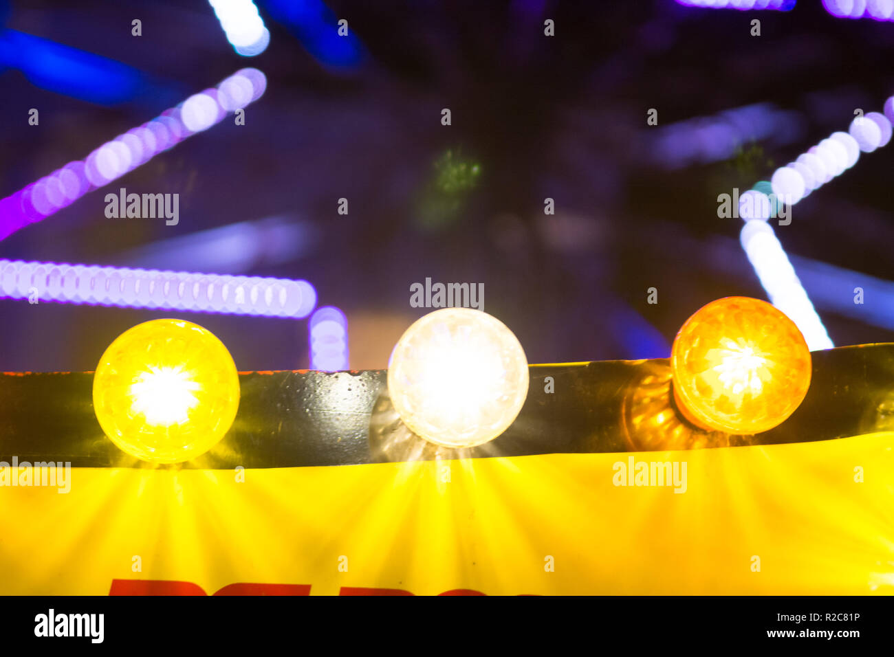 Fun fair lights, blurred for fairground background Stock Photo - Alamy