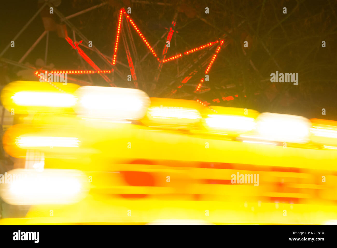 Fun fair lights, blurred for fairground background Stock Photo - Alamy