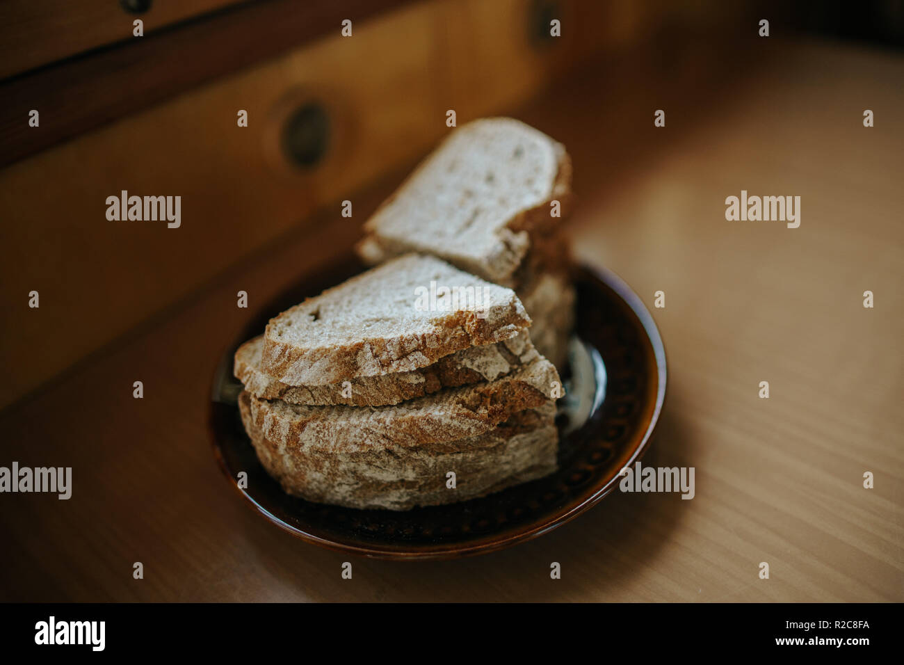 photo of plate of sliced bread Stock Photo - Alamy