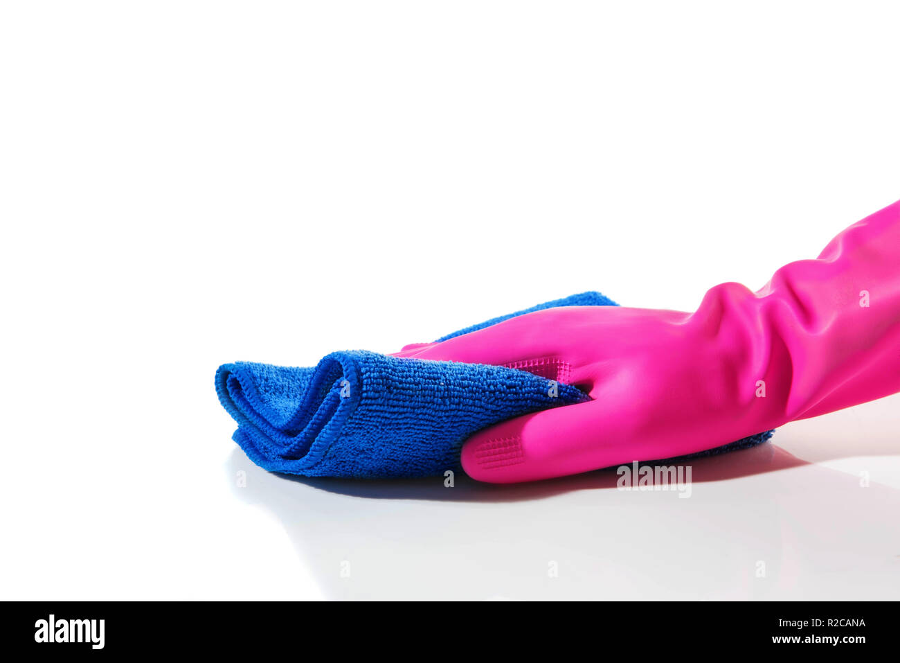 Man in gloves using rag cloth to clean posing isolated over white ...