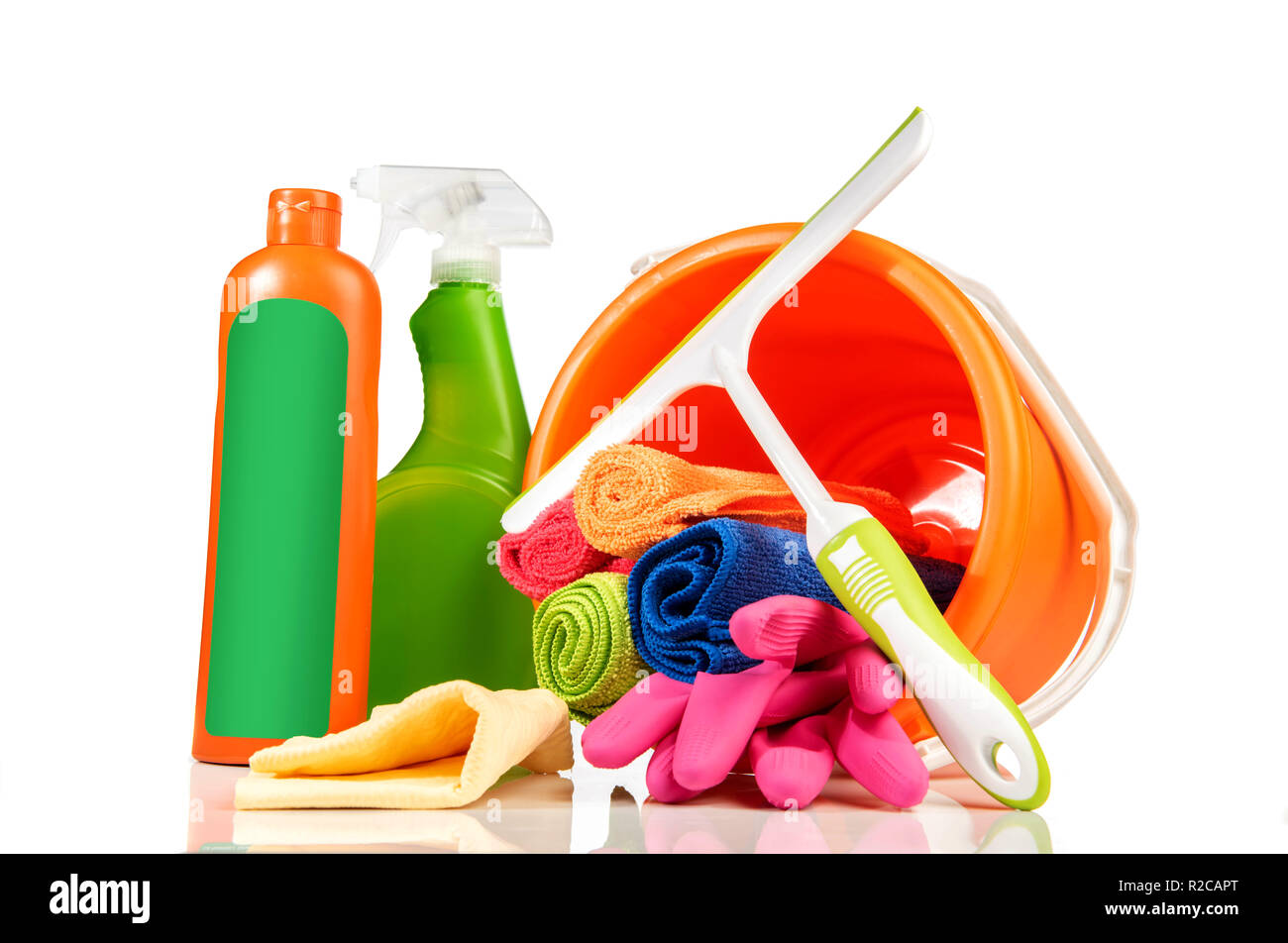 Bucket with cleaning products and tools isolated over white background ...