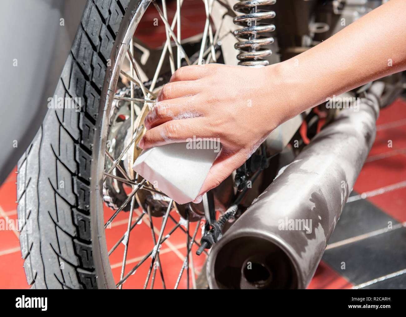 Man washing motorcycle hi-res stock photography and images - Alamy
