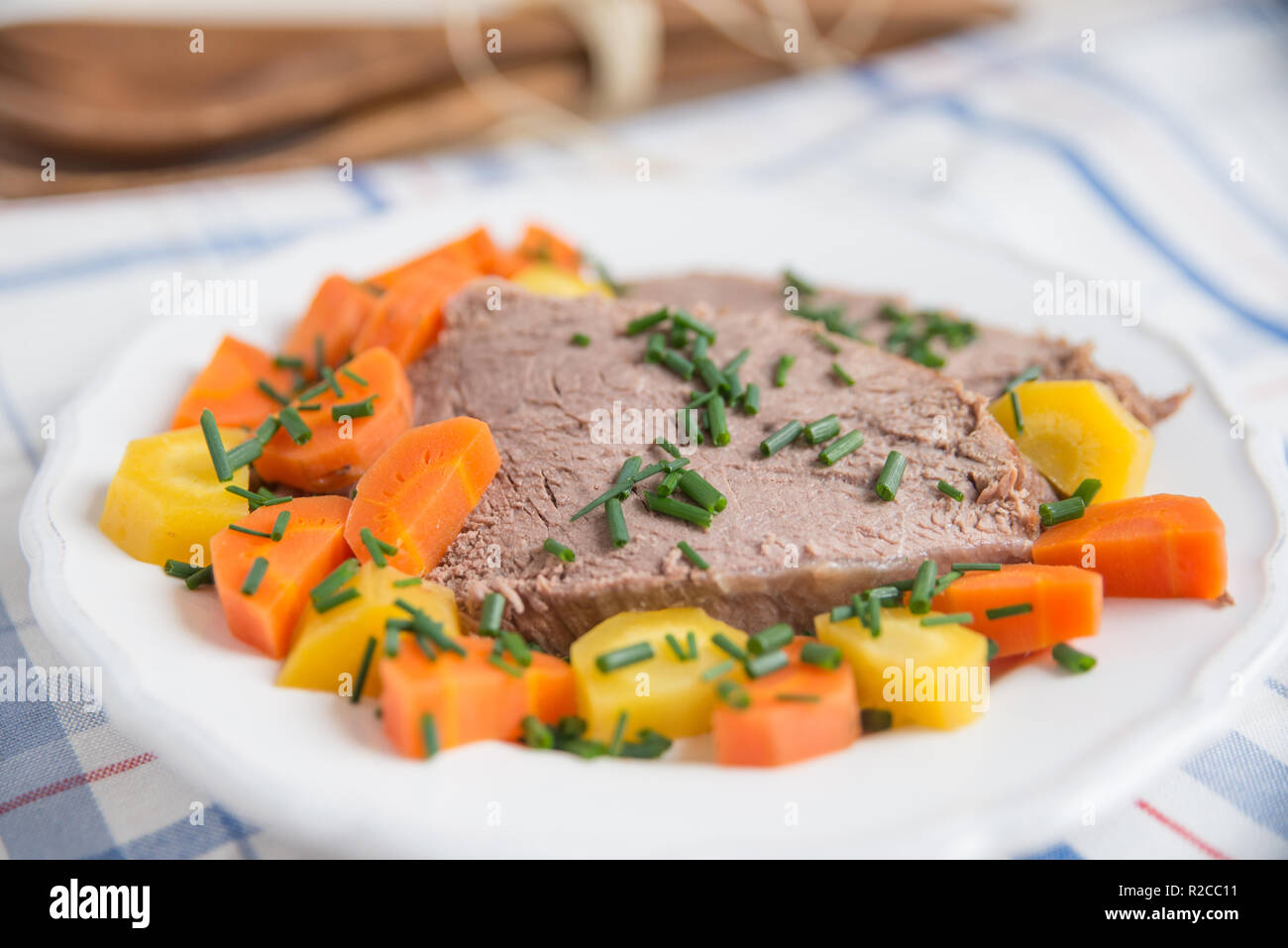 Prime boiled beef with root vegetables, Viennese Tafelspitz Stock Photo ...