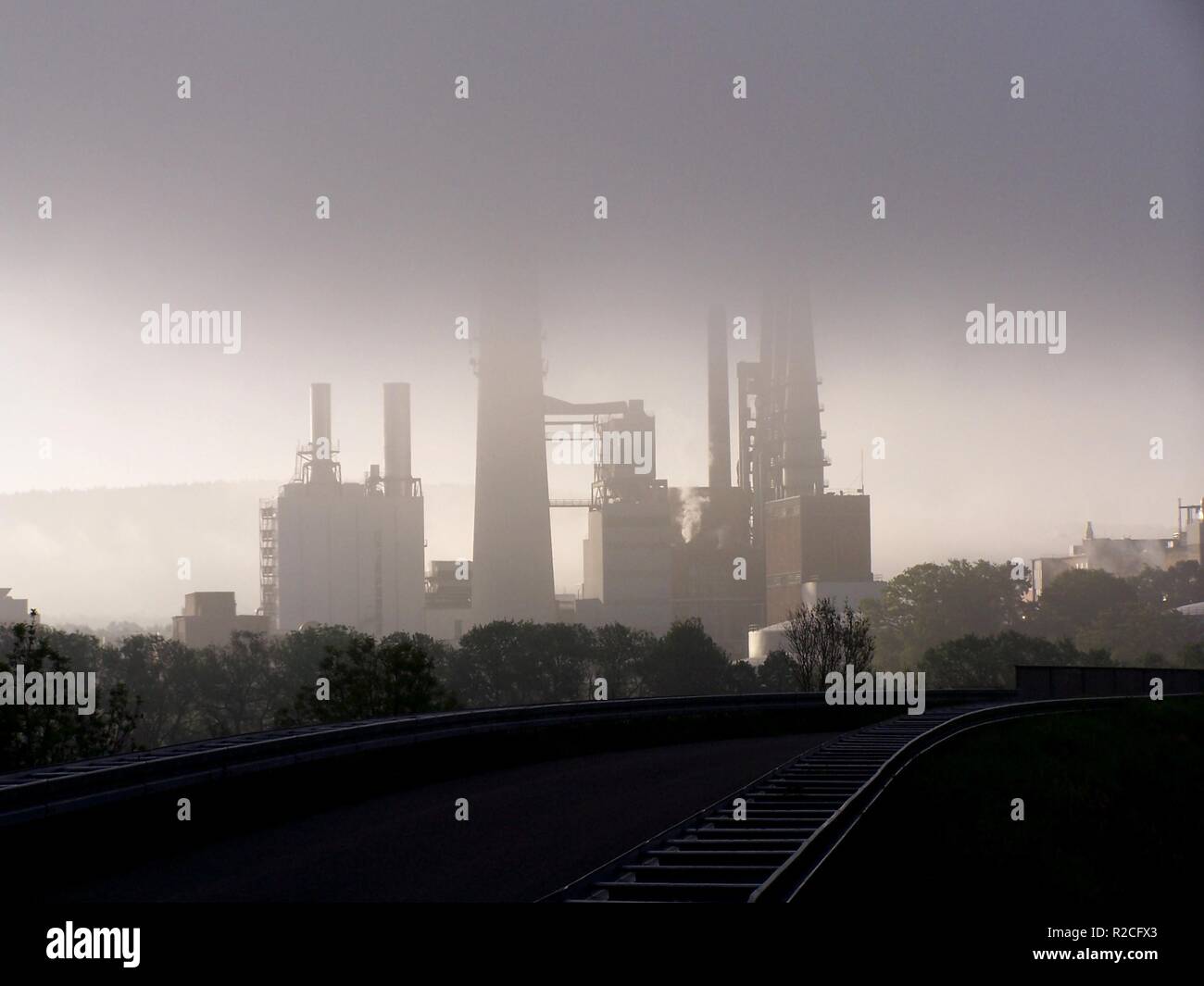 chemical plant in morning mist 1 Stock Photo - Alamy