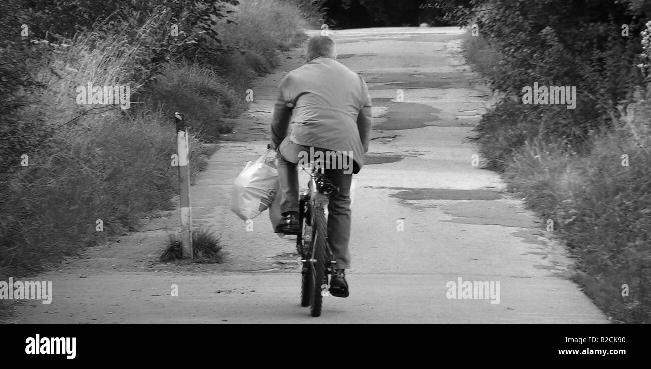 Overloaded bicycle Black and White Stock Photos & Images - Alamy