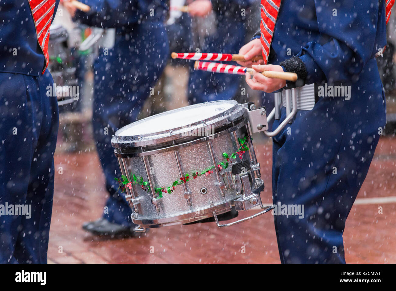 A drummer marches in a holiday Santa parade Stock Photo - Alamy