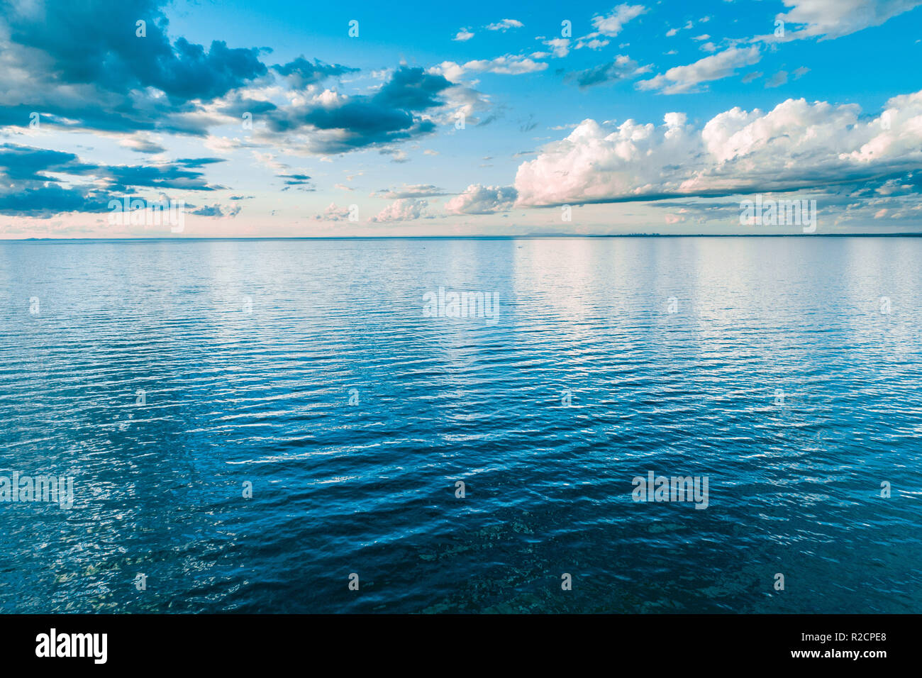 Fluffy clouds sunset water hi-res stock photography and images - Alamy