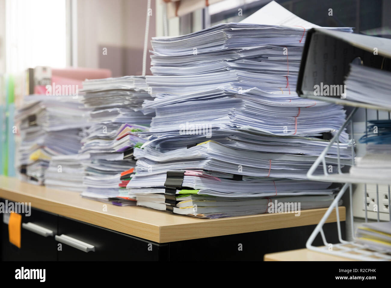 Business and finance concept of office working, Pile of unfinished ...