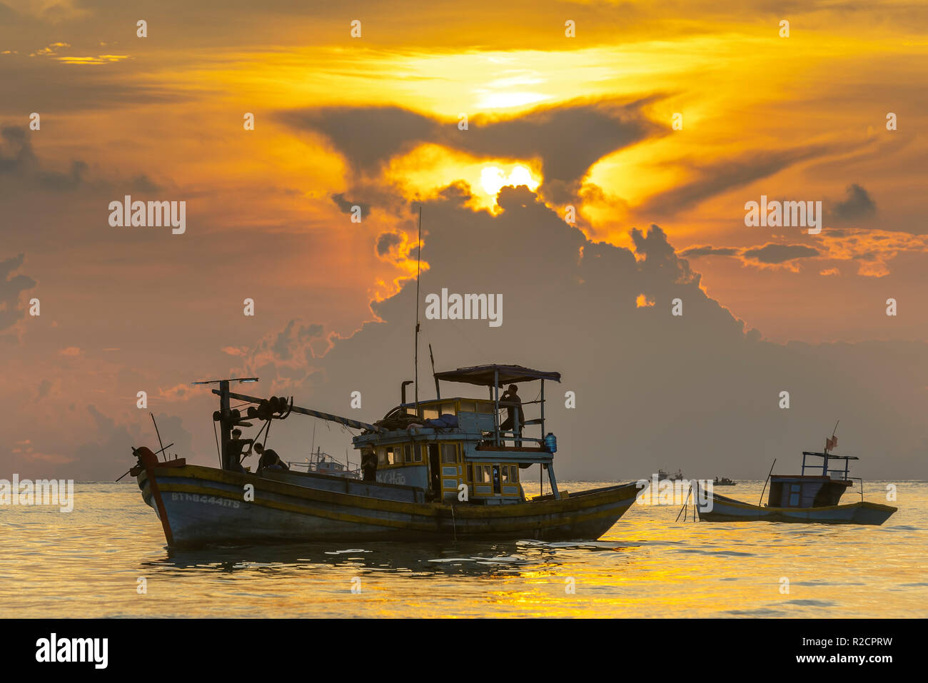 Beautiful beach scene in the morning as the sun rises beside the ...