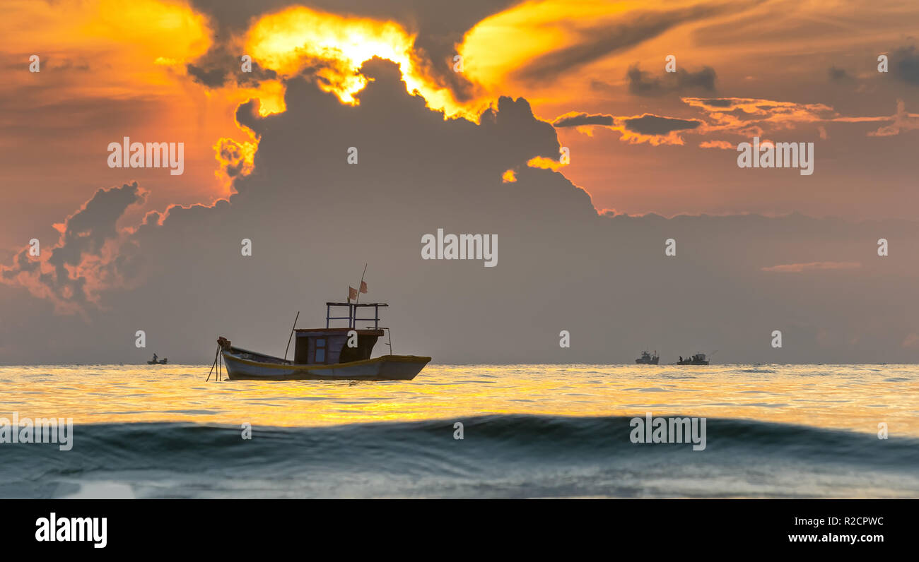 Beautiful beach scene in the morning as the sun rises beside the ...