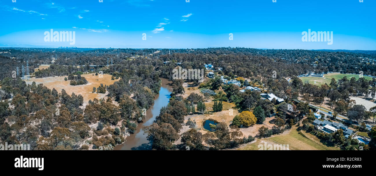Aerial panorama of Yarra River flowing through Eltham suburb in ...