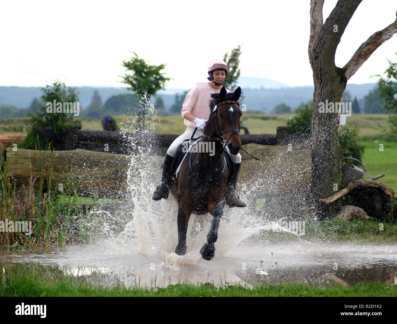 Wet horsewoman hi-res stock photography and images - Alamy