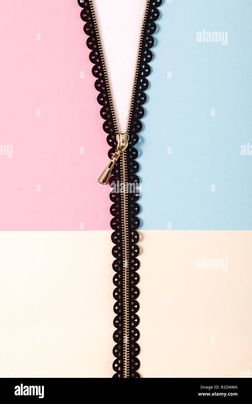colored paper zipper. colors are connected by zipper Stock Photo - Alamy