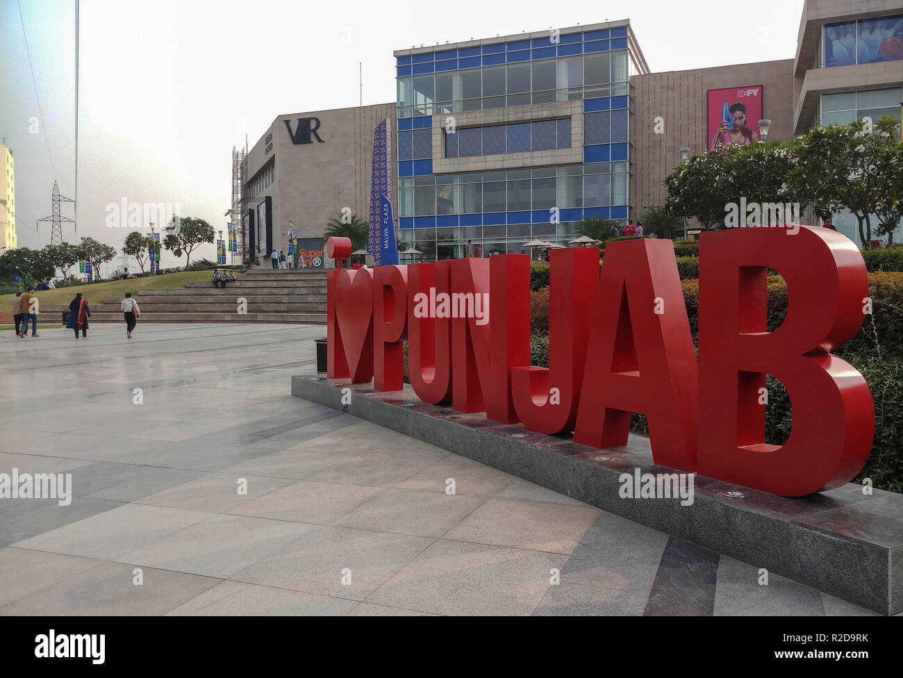 People seen walking outside the shopping mall in Mohali, India. Mohali ...