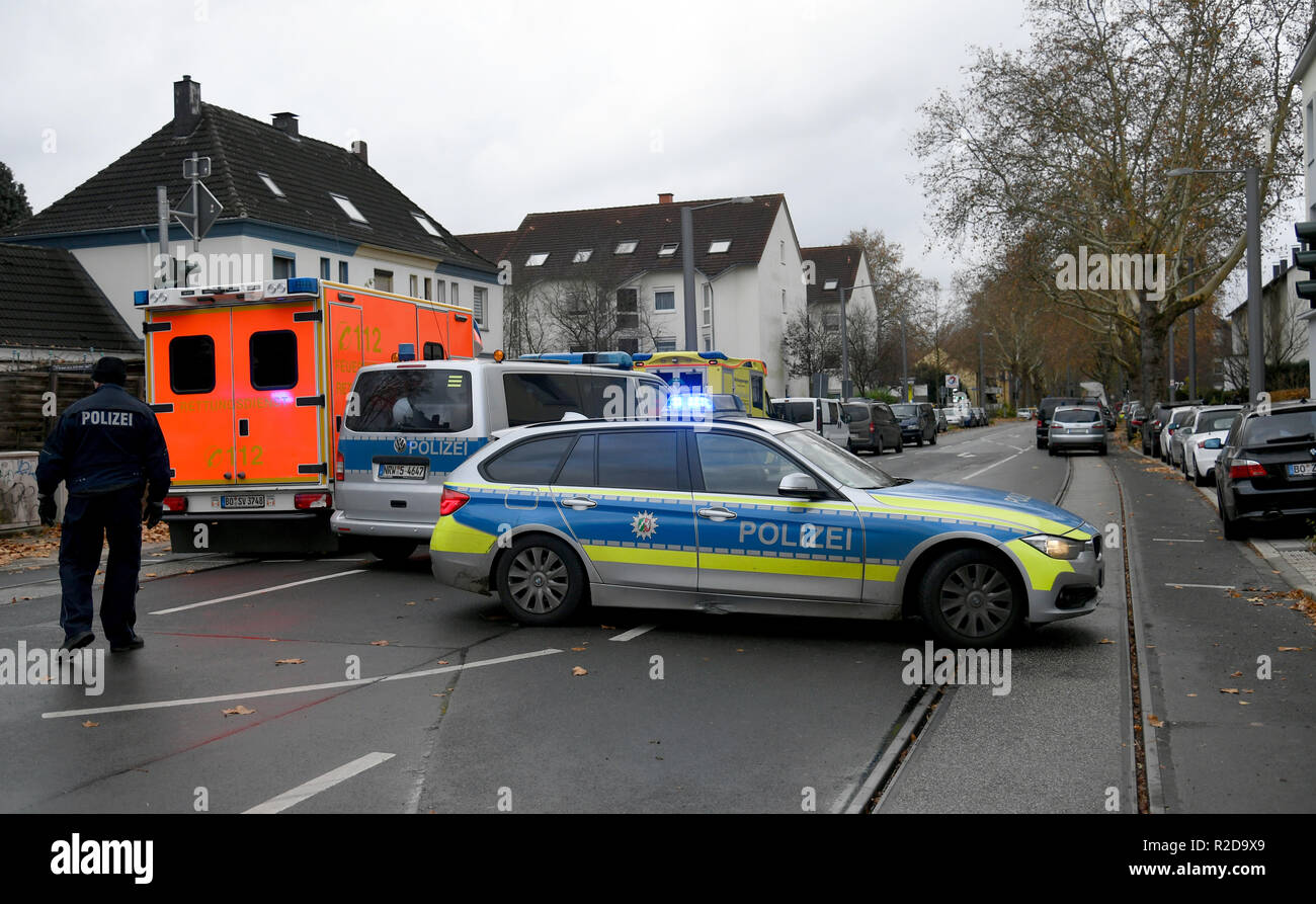 Bochum, Germany. 19th Nov, 2018. Police cars are parked on the main ...