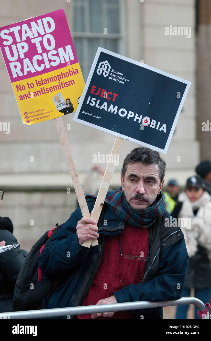 London, UK. 17th Nov, 2018. A protester seen holding an anti-racist ...