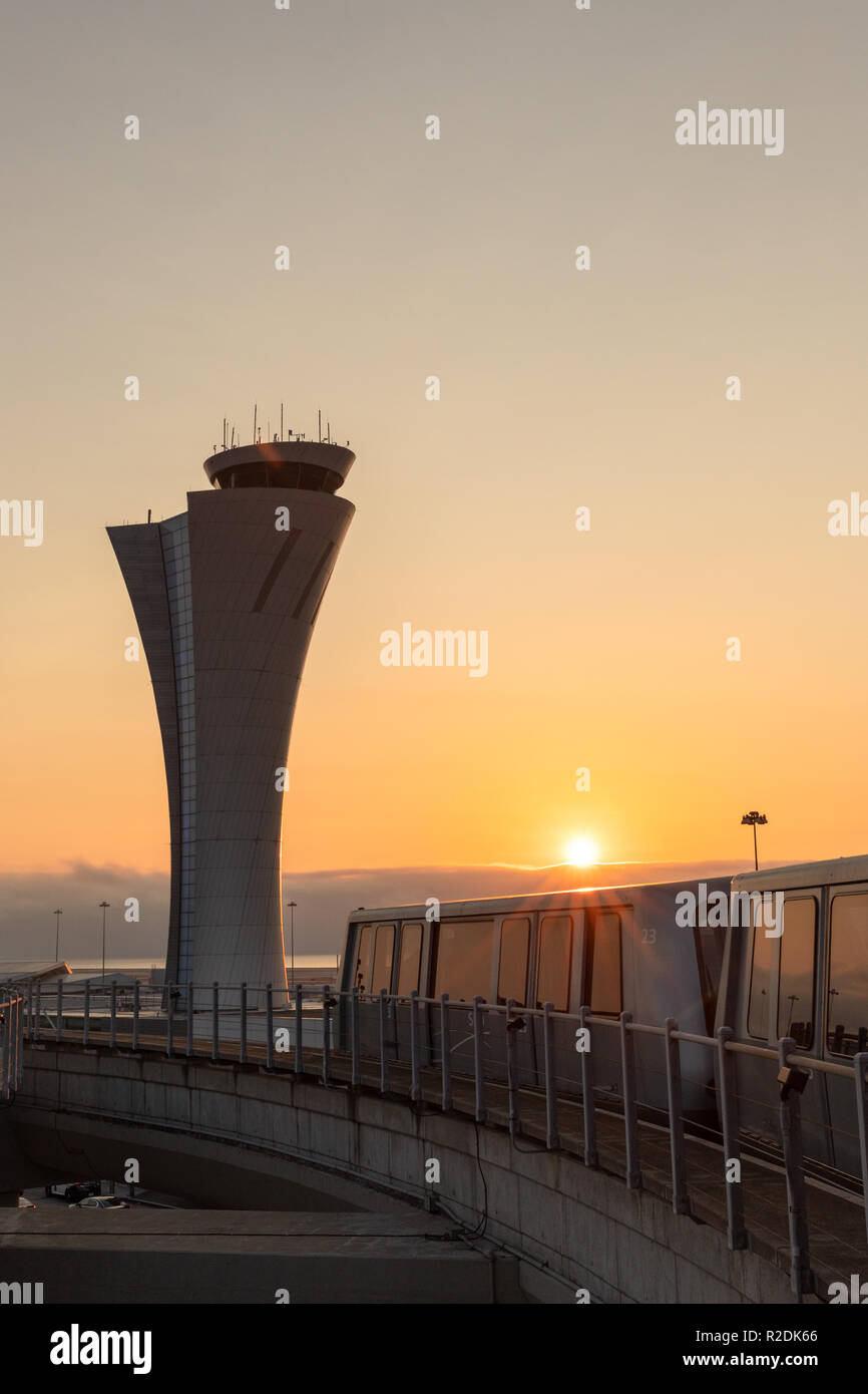 The train and control tower of SFO airport Stock Photo - Alamy