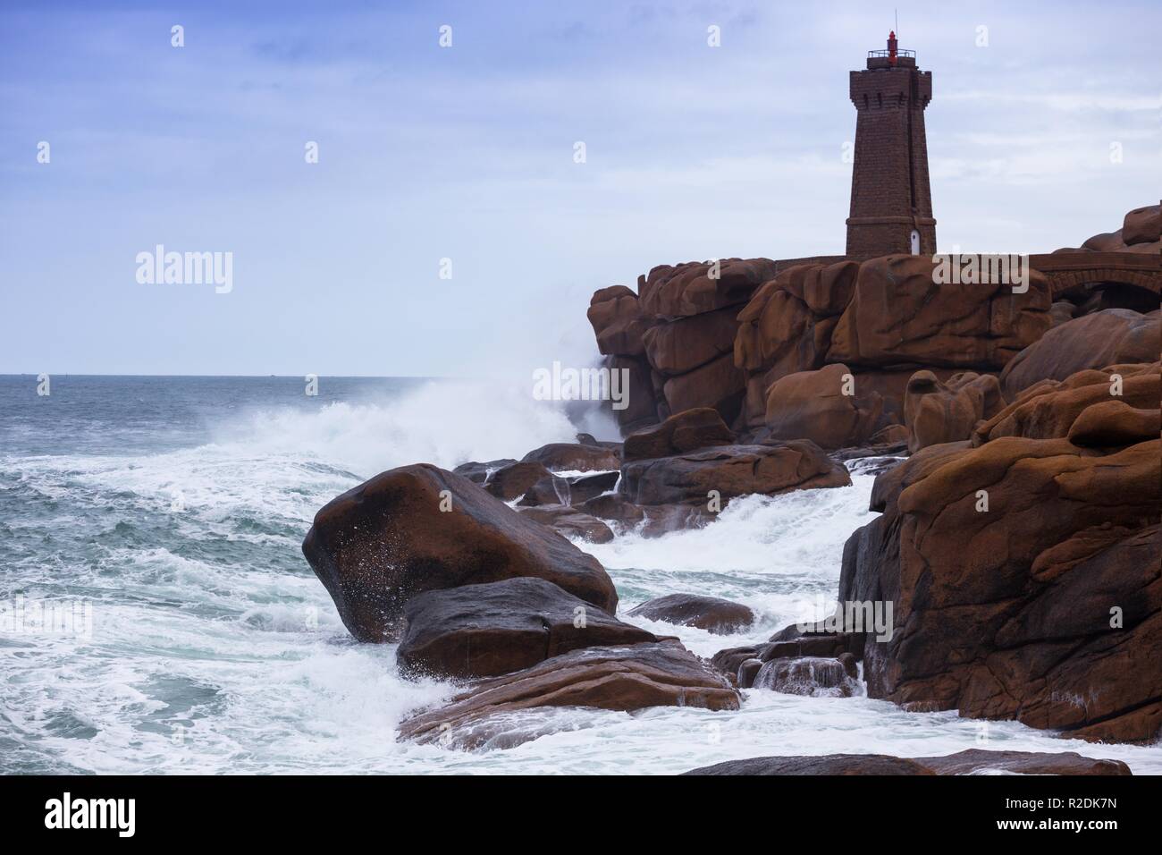 lighthouse Phare de Men Ruz and typical Brittany coast at the Tregastel ...
