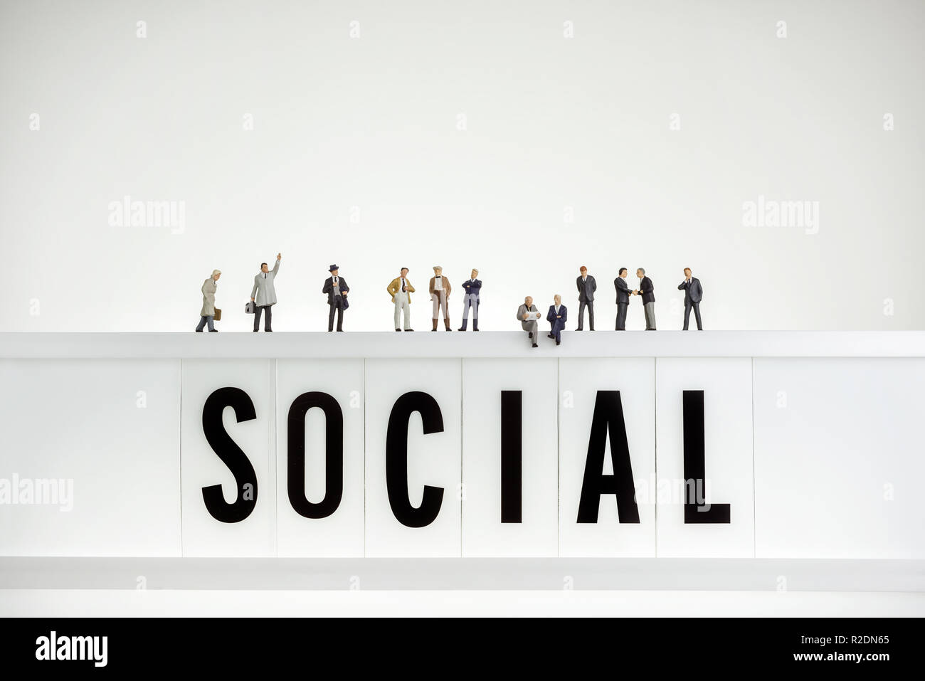 Crowd of miniature people. Social gathering concept Stock Photo - Alamy