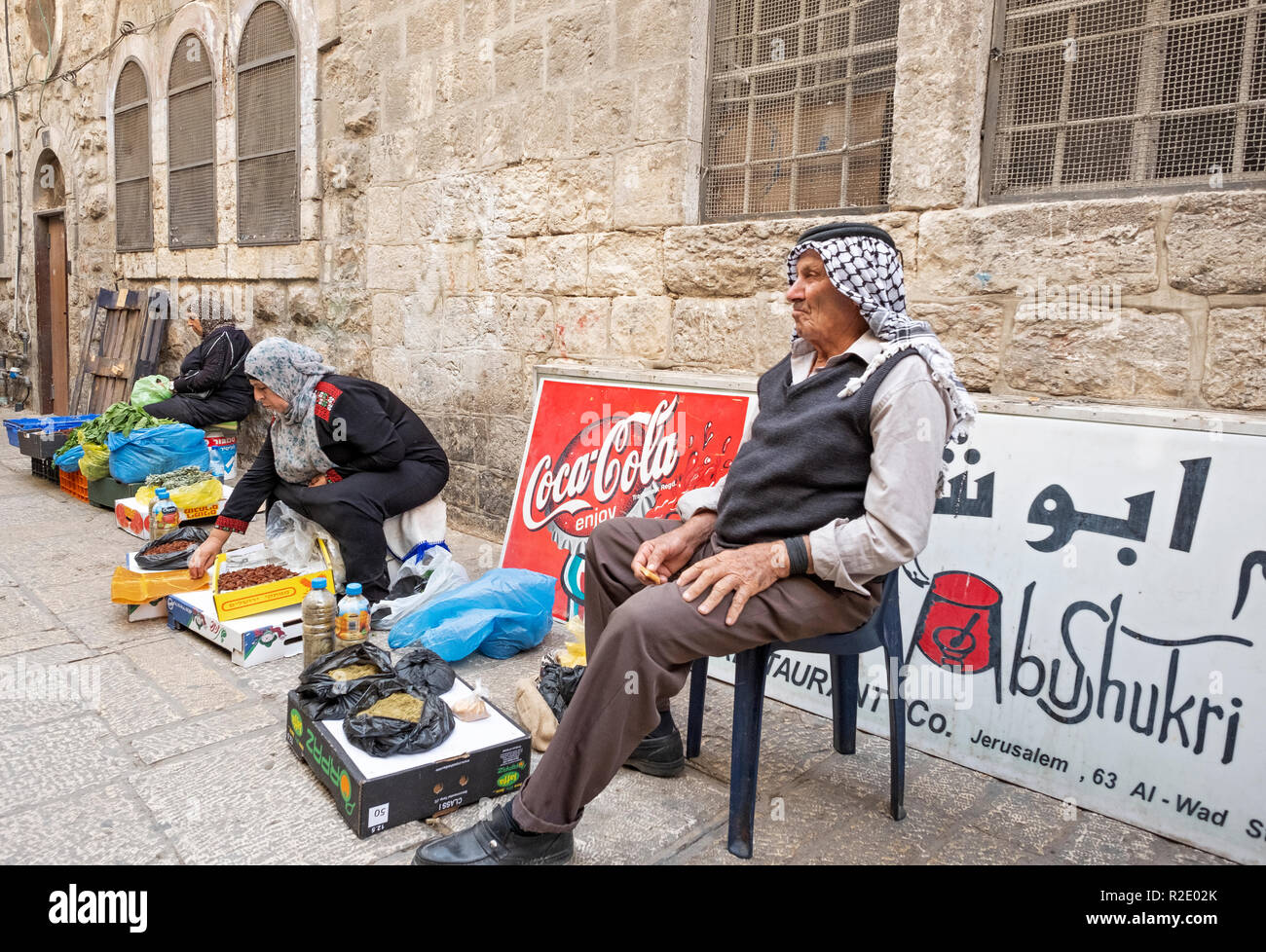 Arabic merchants selling spices and dried fruit in the Muslim Quarter ...